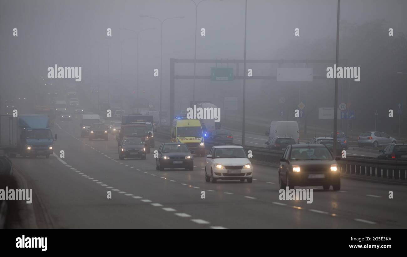 Driving a car in bad weather conditions, foggy day on the road Stock ...
