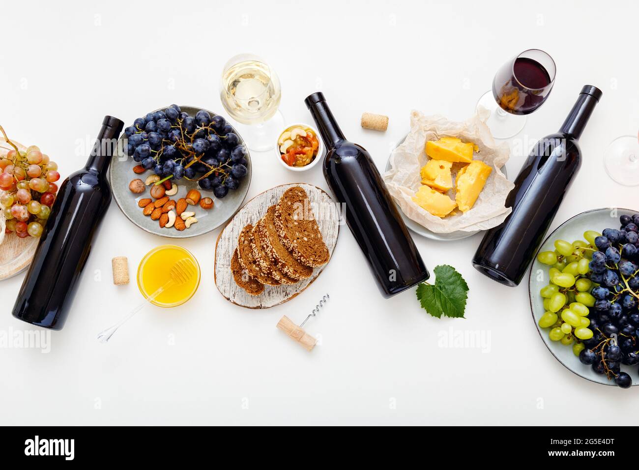 Festive table served with red wine and Mediterranean food appetizer ...