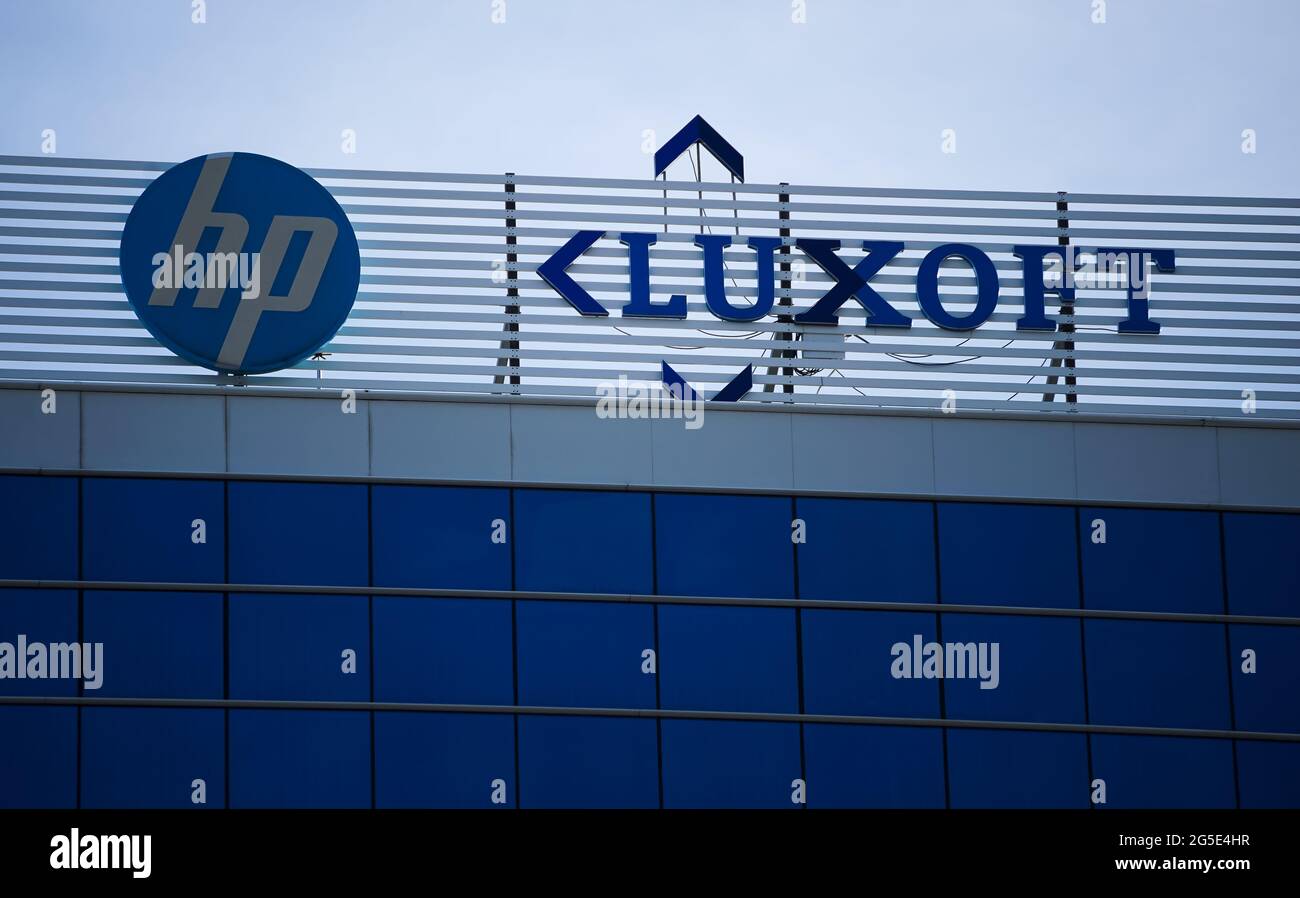 Bucharest, Romania - January 21, 2021: HP and Luxoft logo are seen on ...