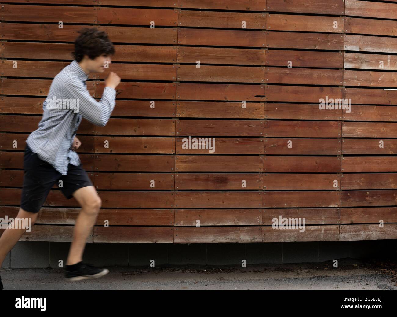 young man hurry up, running fast on the meeting Stock Photo - Alamy