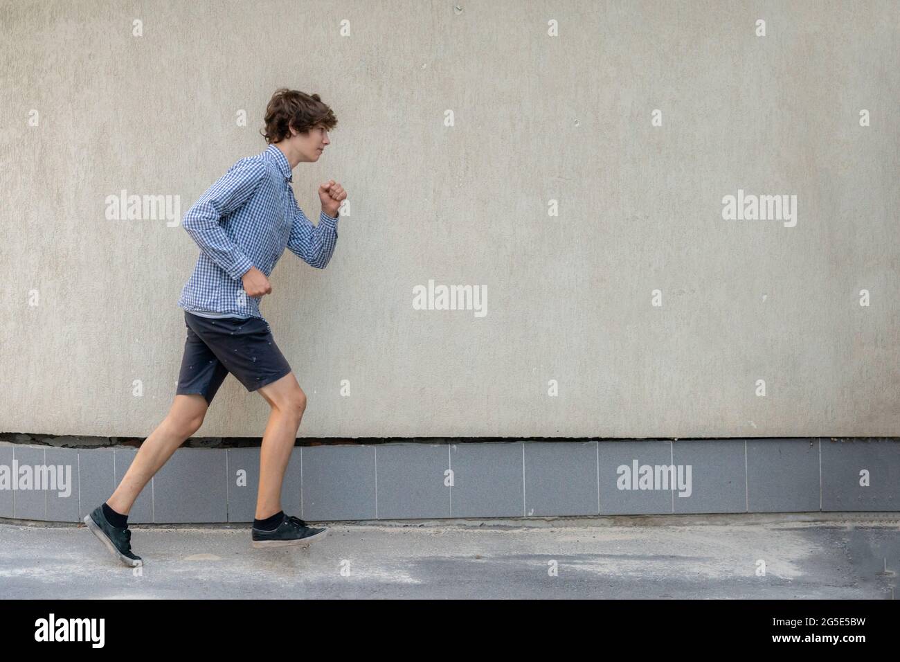 young man hurry up, running fast on the meeting Stock Photo - Alamy