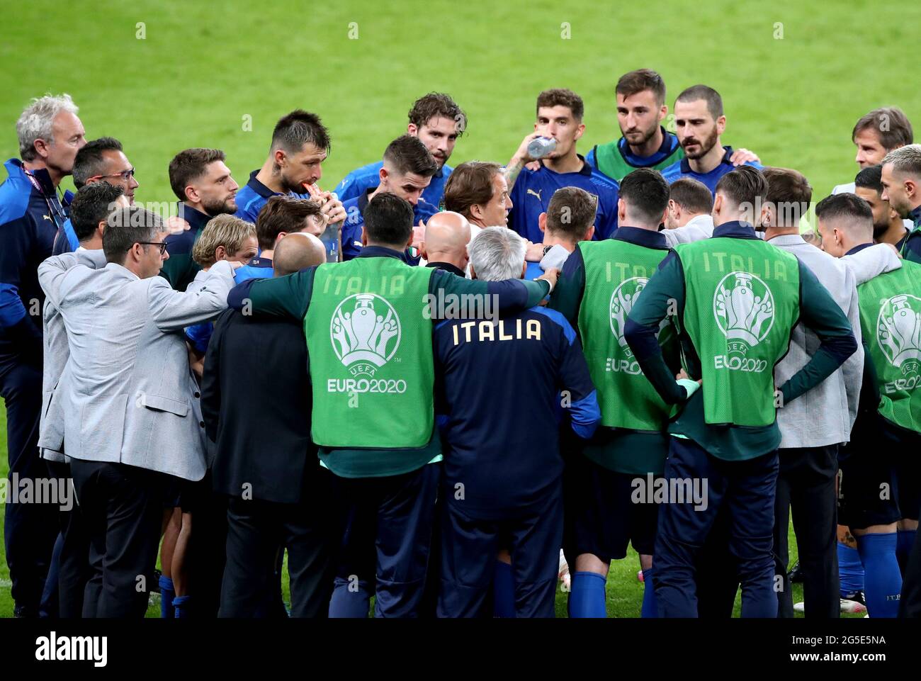 Italy manager Roberto Mancini speaks to his players before the start of ...