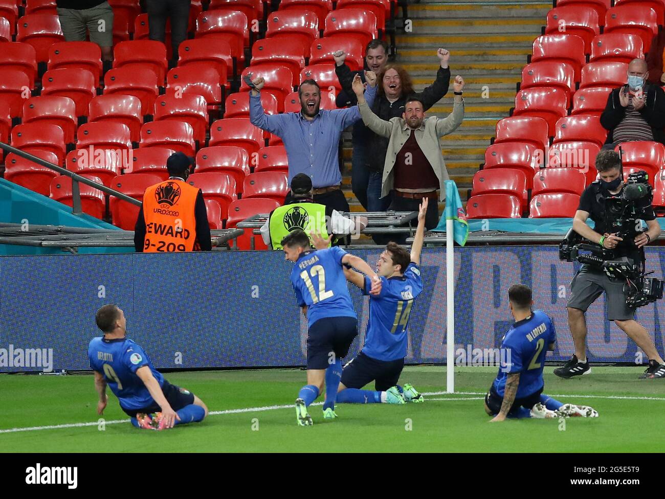 London, England, 26th June 2021. Federico Chiesa of Italy slides to his ...