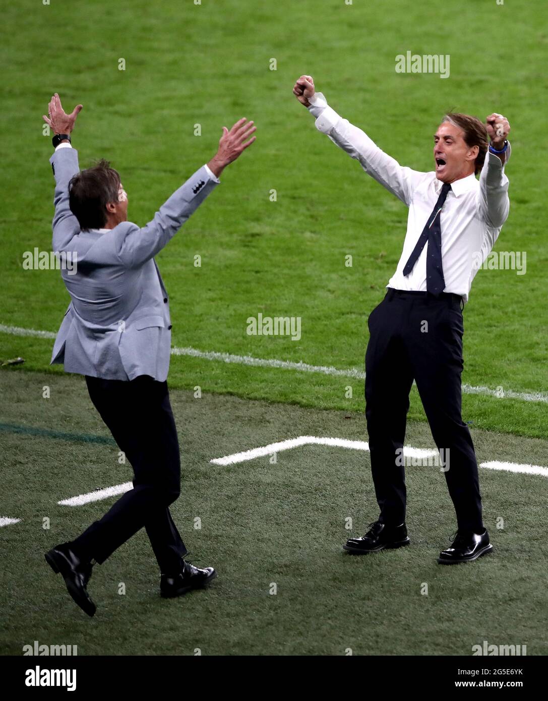 Italy manager Roberto Mancini (right) celebrates at the end of the UEFA ...
