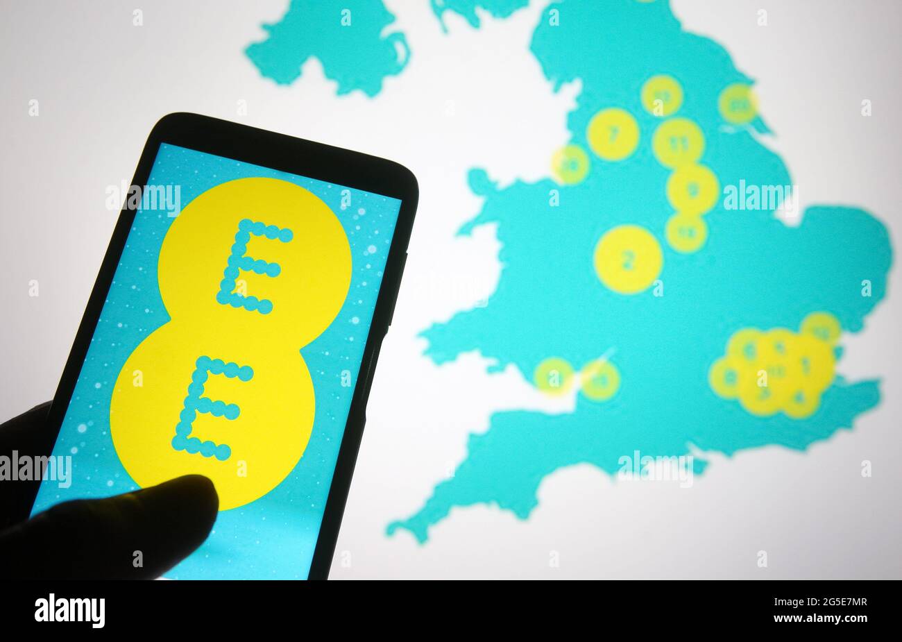 In this photo illustration the EE logo of a British mobile network ...