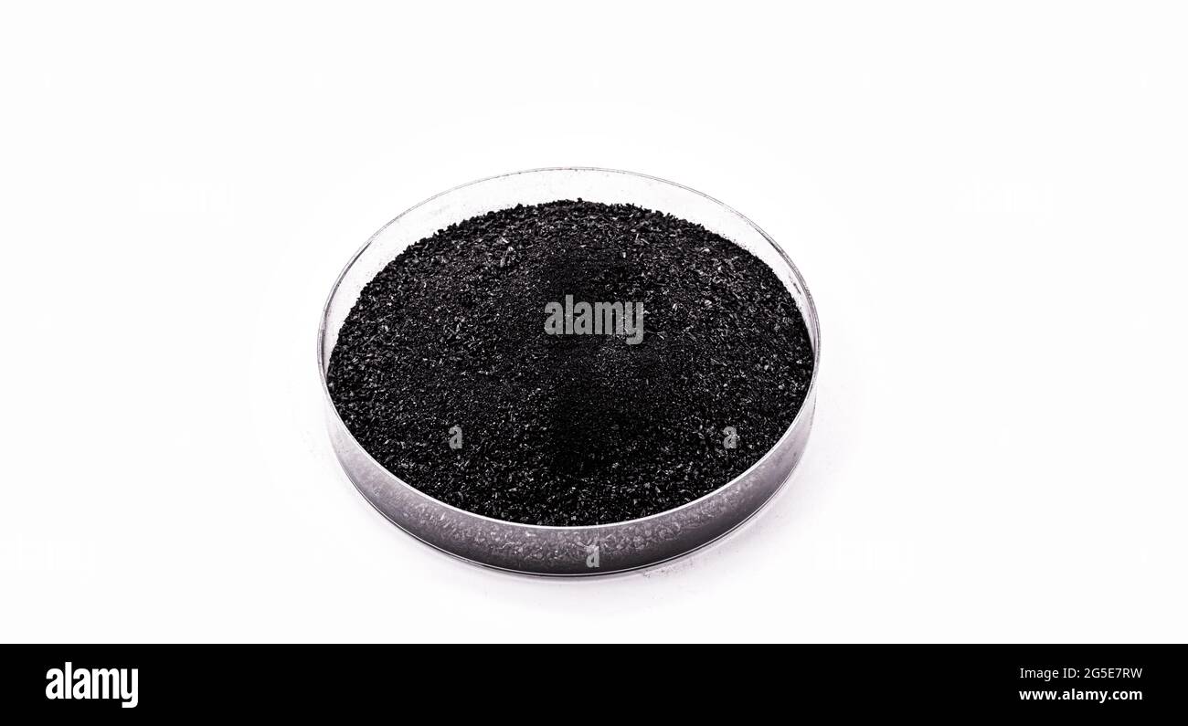 graphite powder used in industry, black powder with isolated white ...