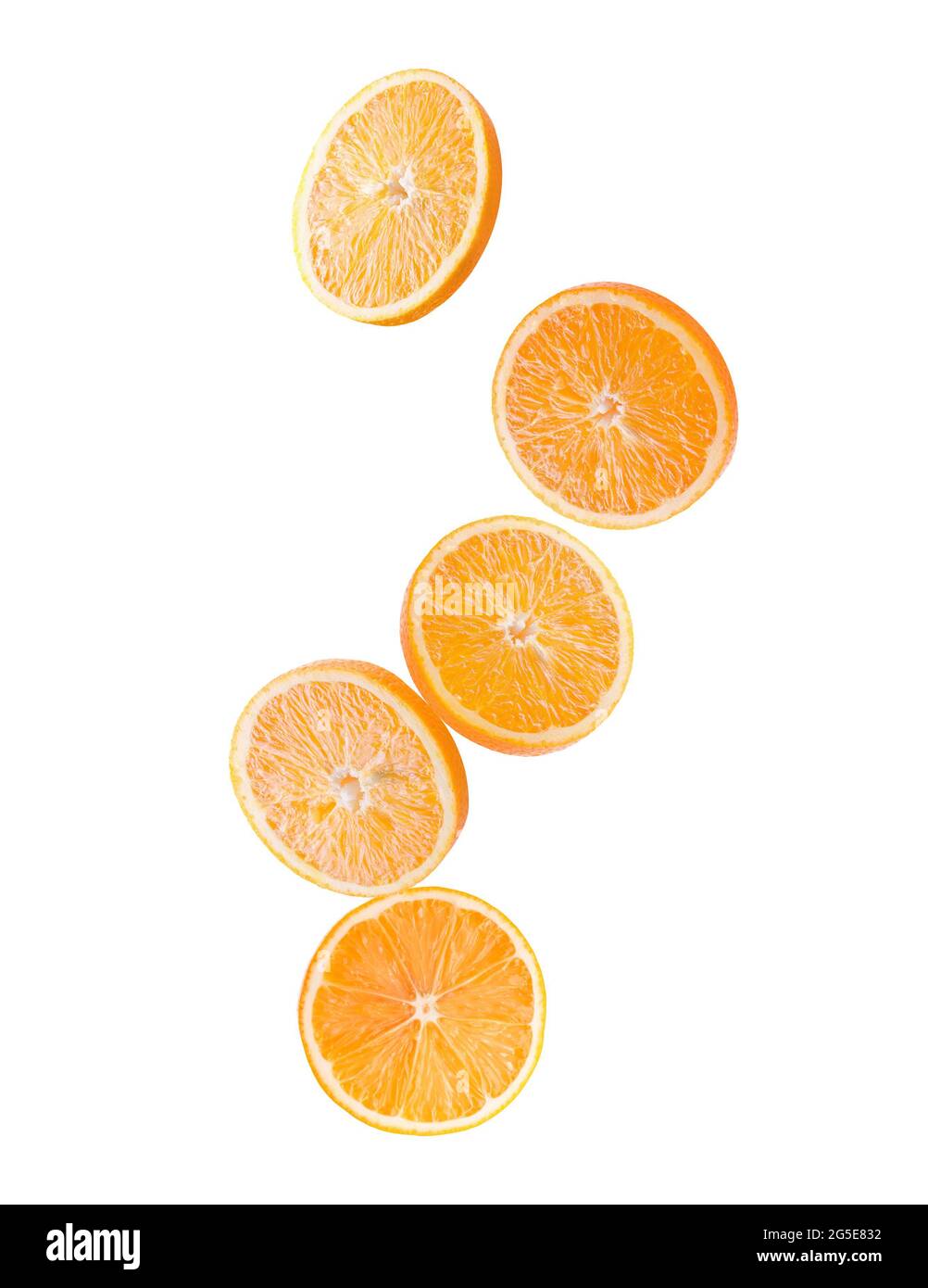 falling orange slices isolated on a white background Stock Photo - Alamy