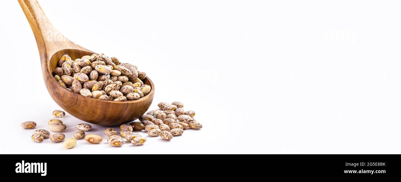 rustic wooden ladle with brazilian beans, wooden spoon, isolated white ...