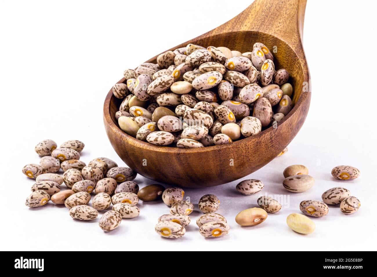 rustic wooden ladle with brazilian beans, wooden spoon, isolated white ...