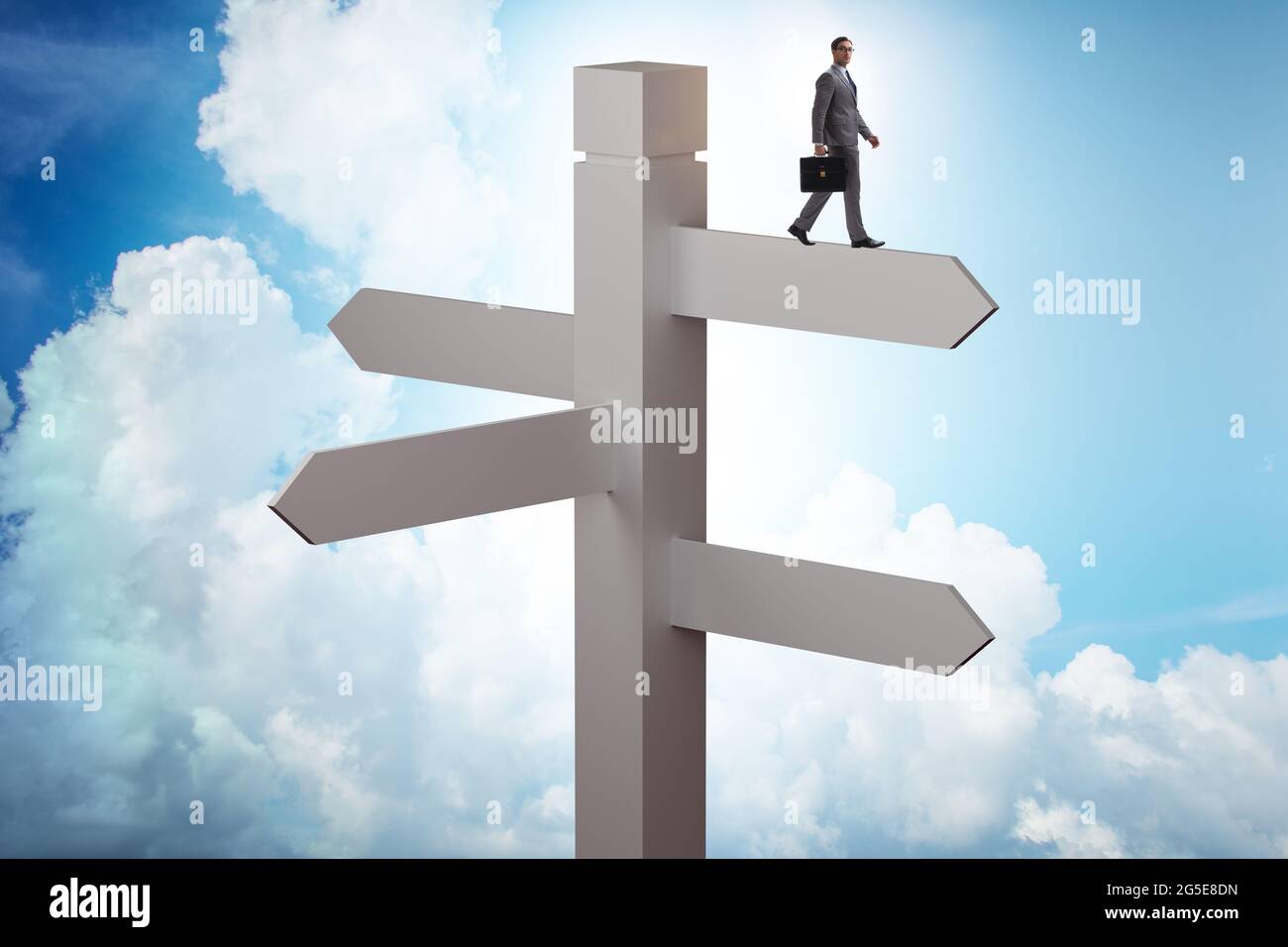 Businessman at the crossroads choosing the strategy Stock Photo - Alamy