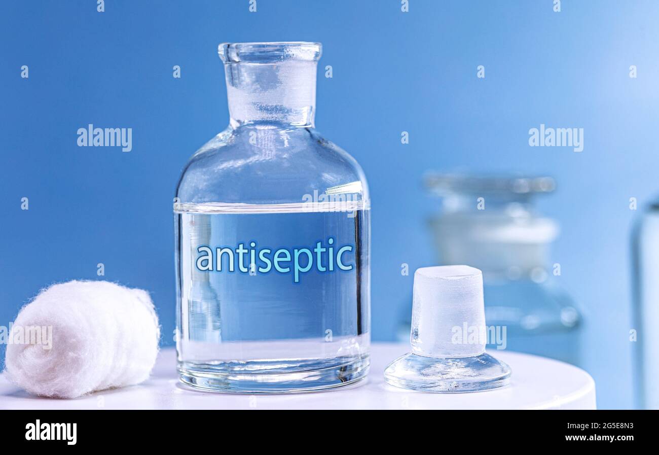 glass hospital container with hydrogen peroxide, written in antiseptic ...