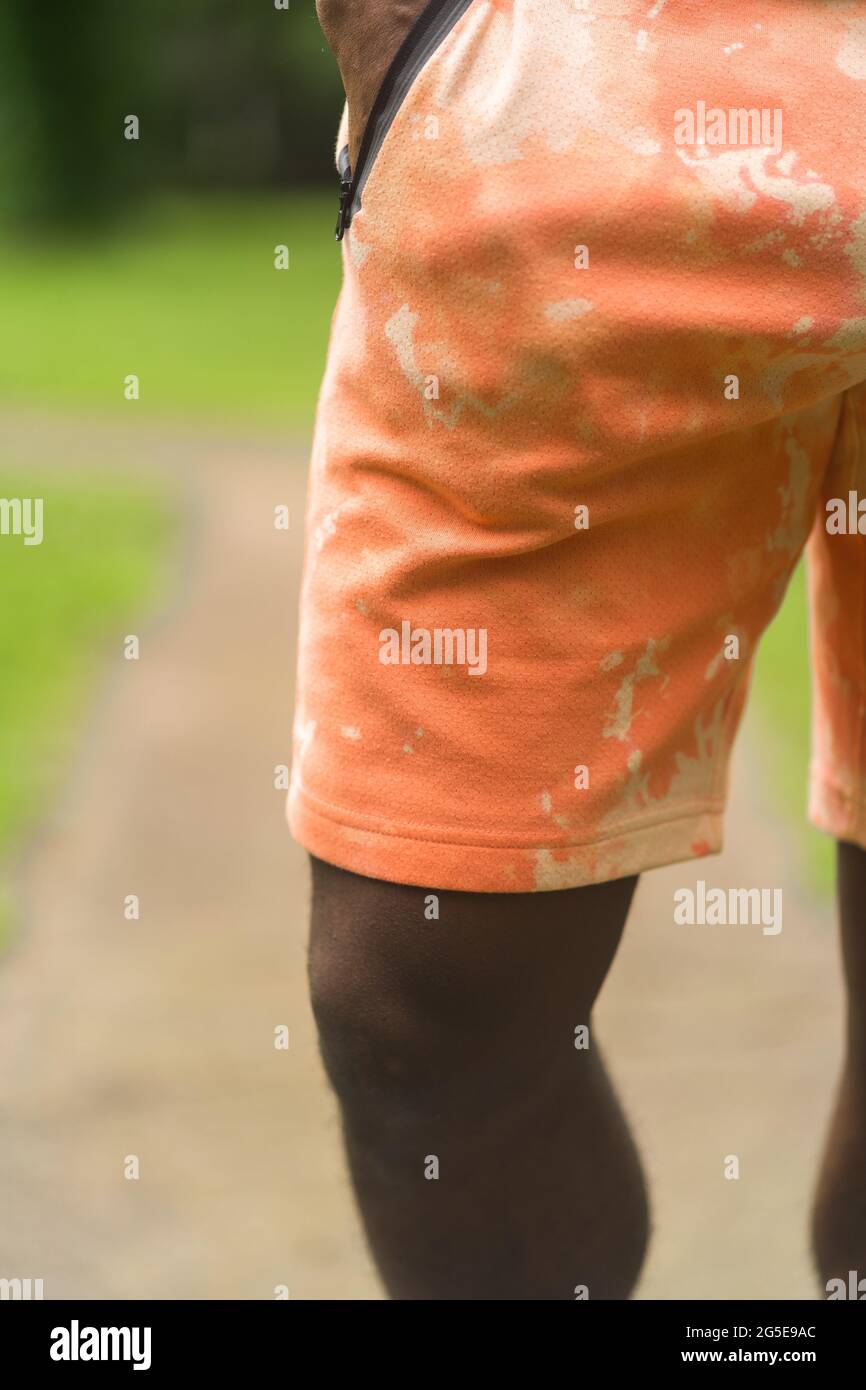 Orange and black dress hi-res stock photography and images - Alamy