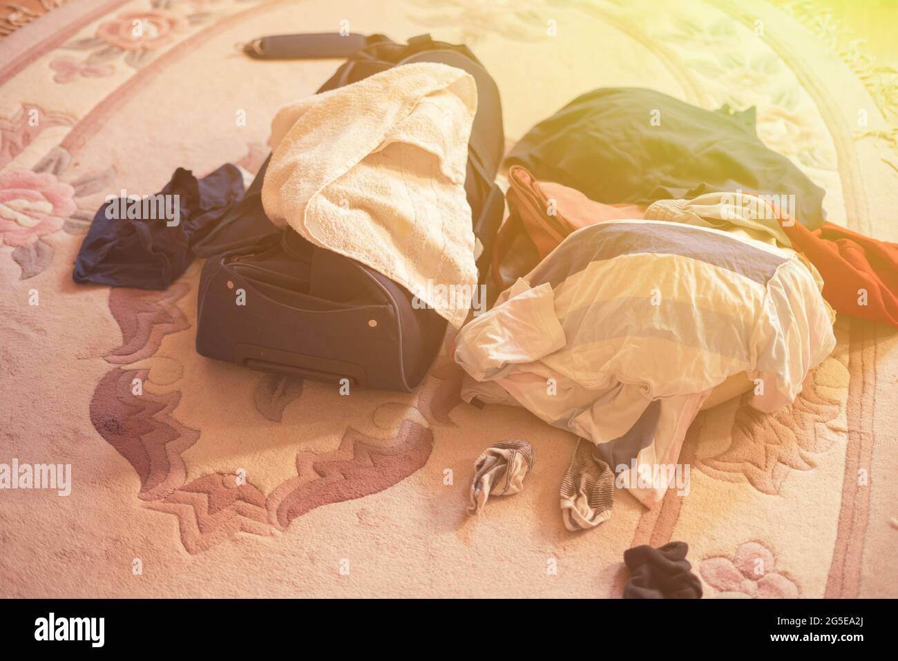 Suitcase packing mess hi-res stock photography and images - Alamy