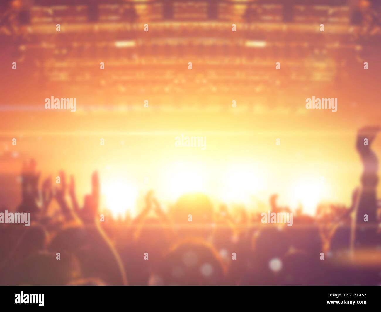 Blurred concert crowd shot, people and a stage are visible Stock Photo ...