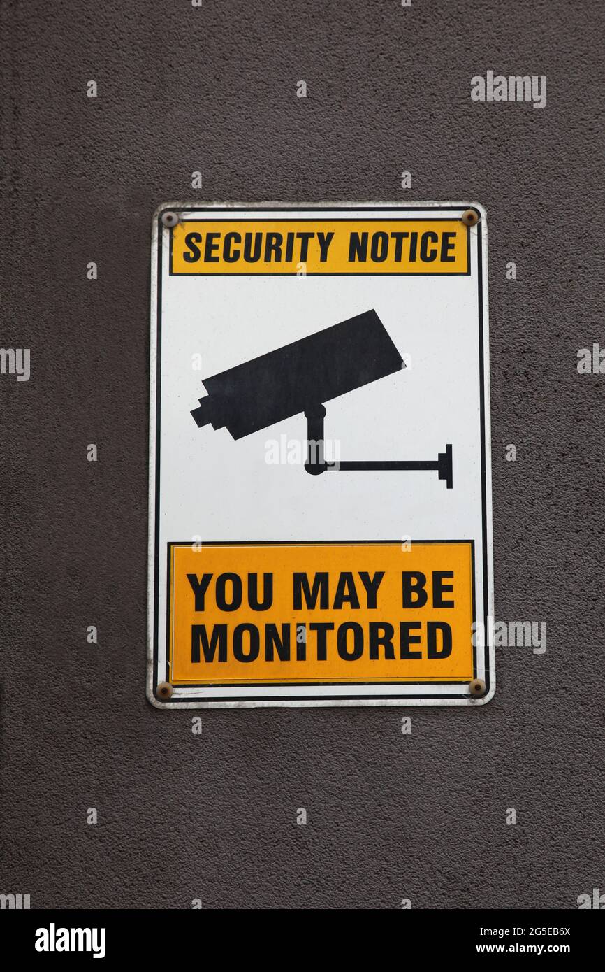 A security surveillance sign Stock Photo - Alamy