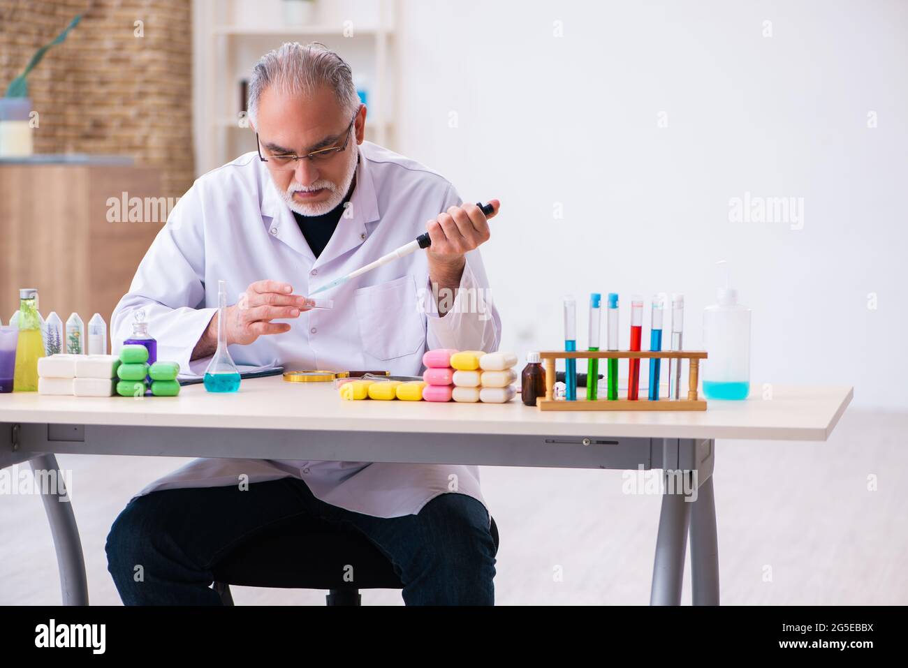Old chemist testing soap in the lab Stock Photo - Alamy