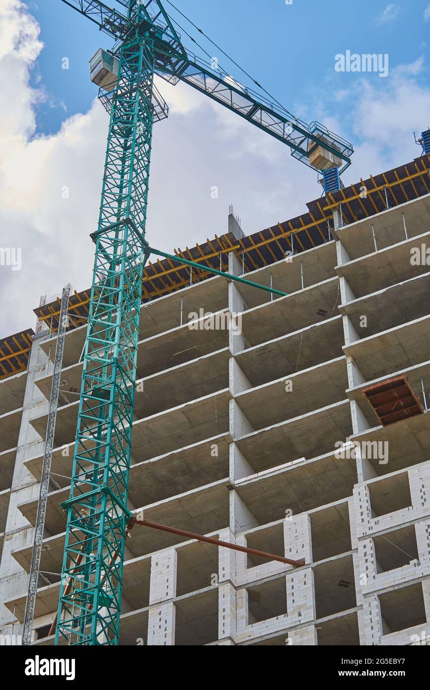 Construction site. High rise Building under construction. Construction ...