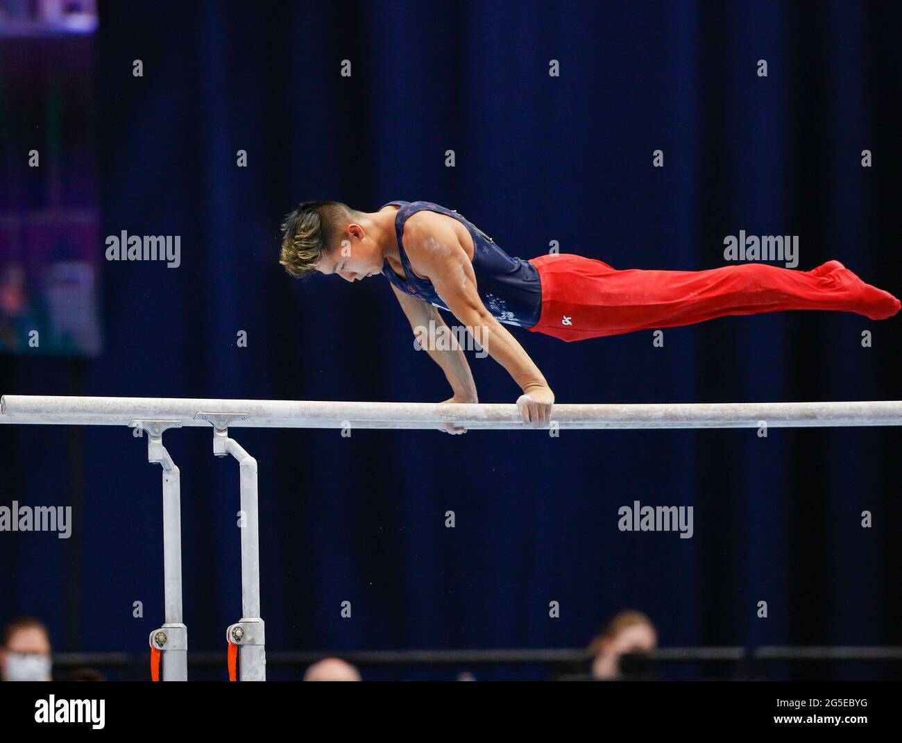 June 265, 2021: Yul Moldauer performs on the parallel bars during Day 2 ...