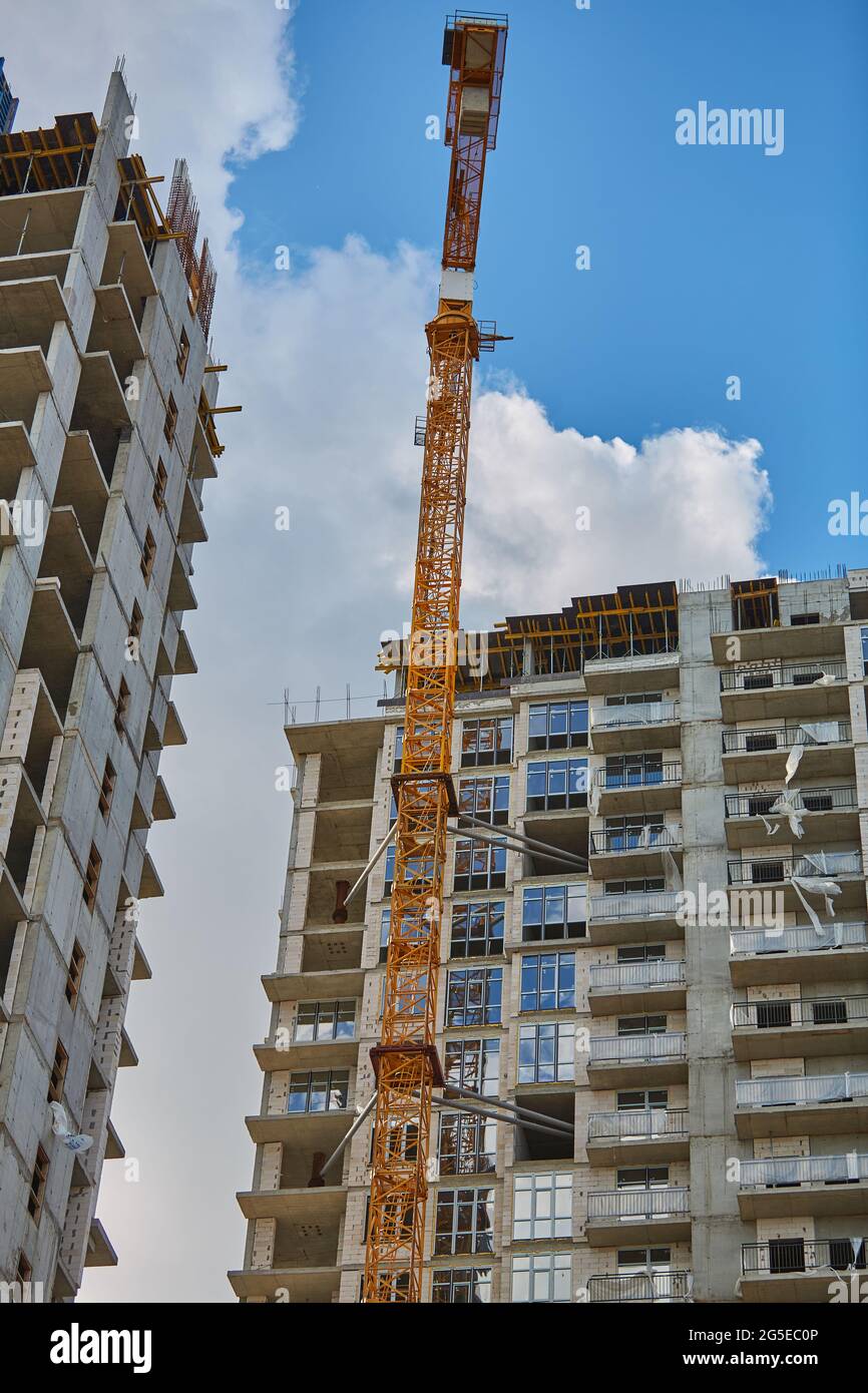 Construction site. High rise Building under construction. Construction ...