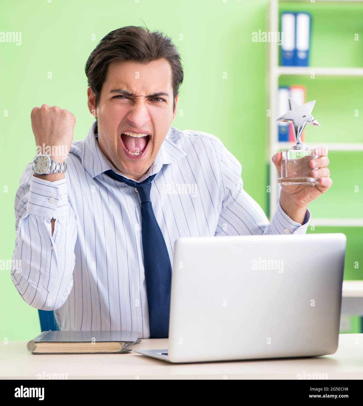 The businessman having problems with paperwork and workload Stock Photo ...