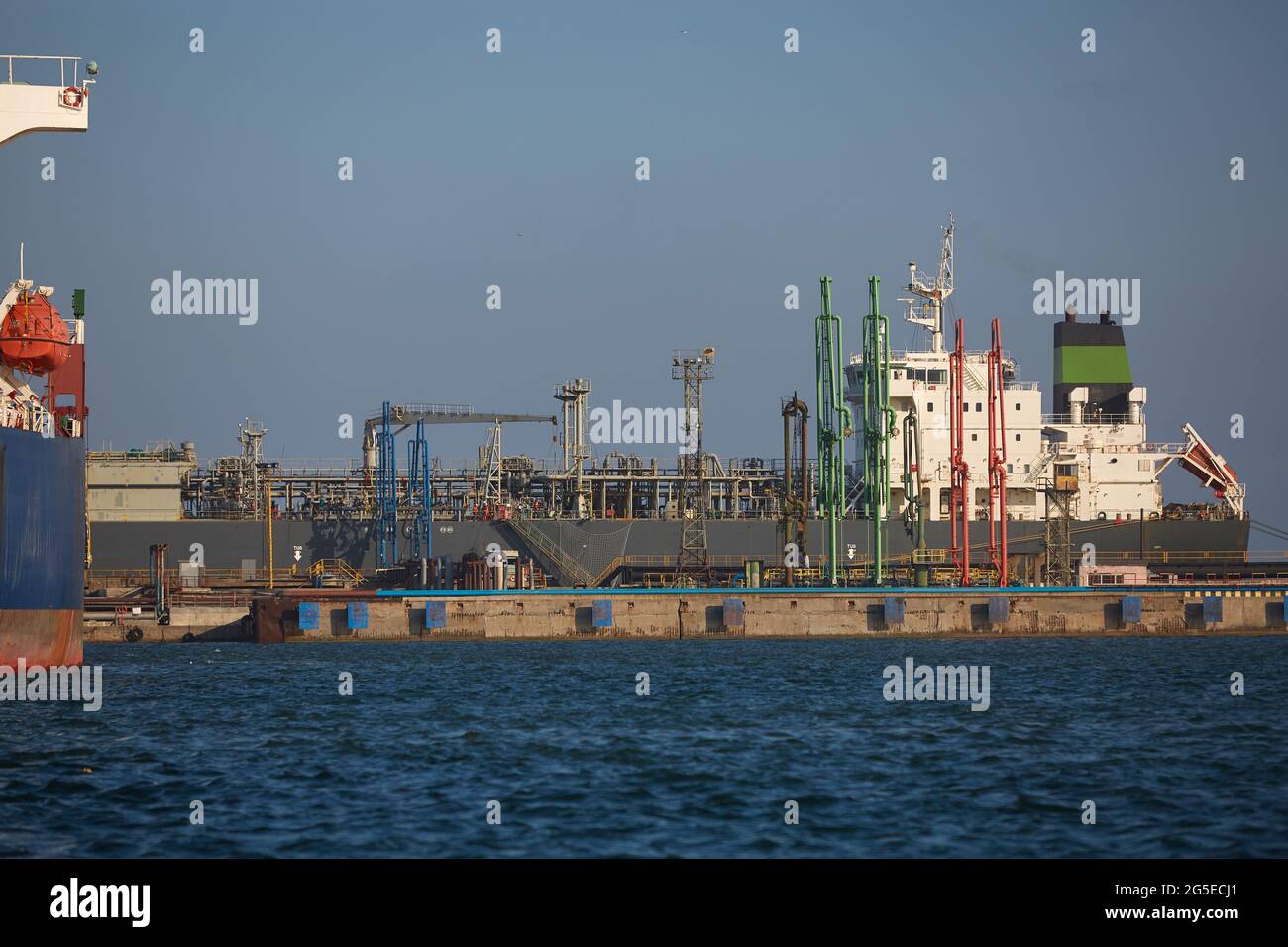 merchant vessel is gas carrier at port log terminal. The tanker at the ...