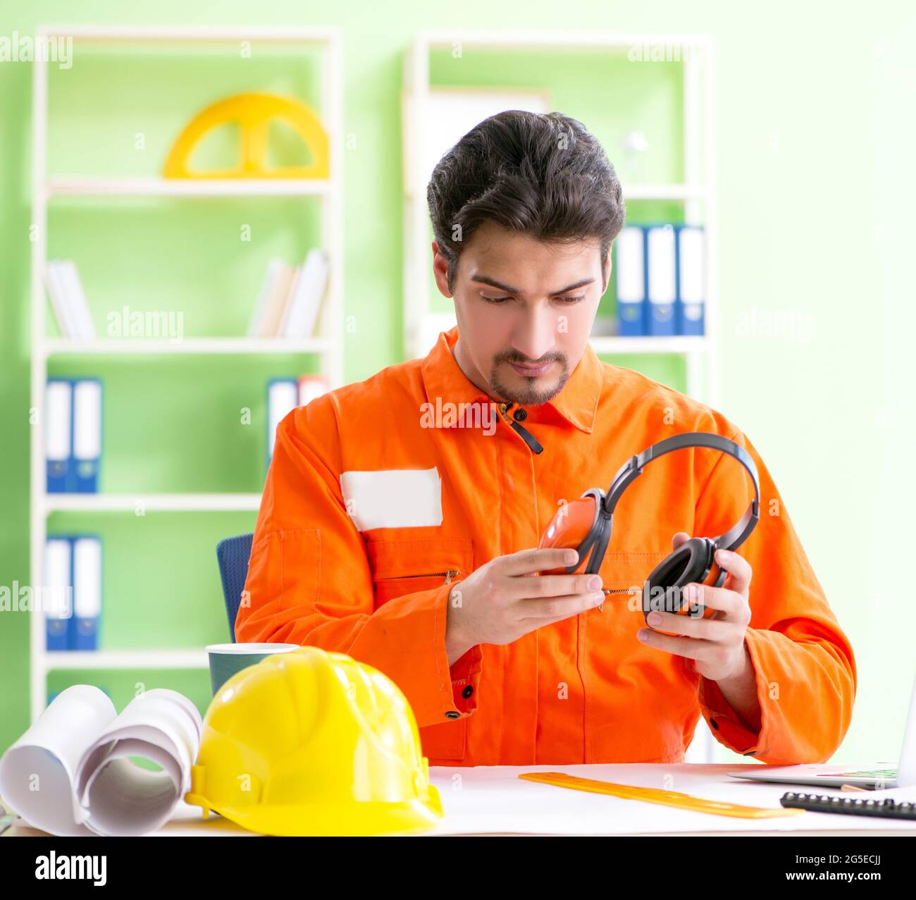 The construction supervisor planning new project in office Stock Photo ...