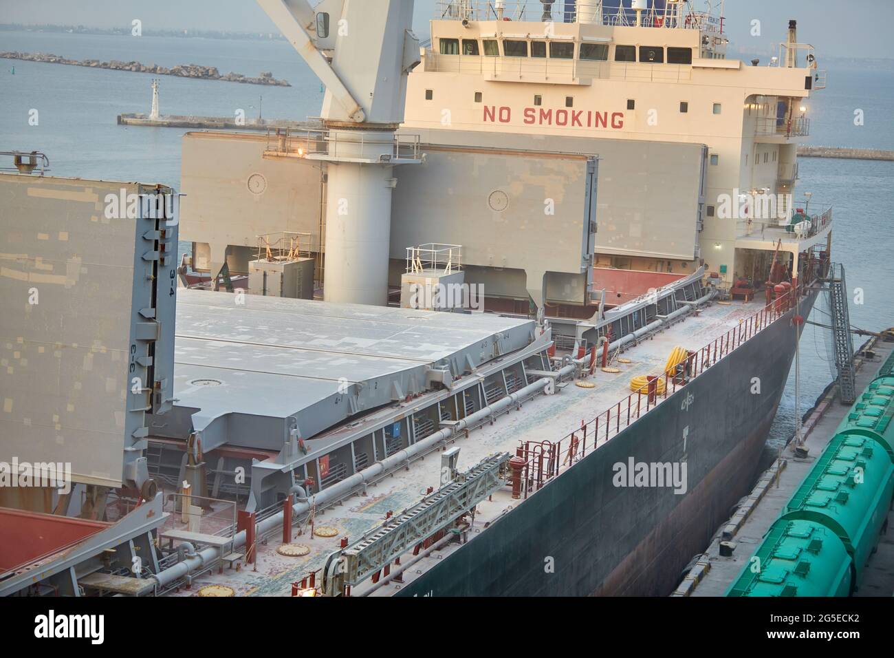 Port grain elevator. Industrial sea trading port bulk cargo zone grain ...