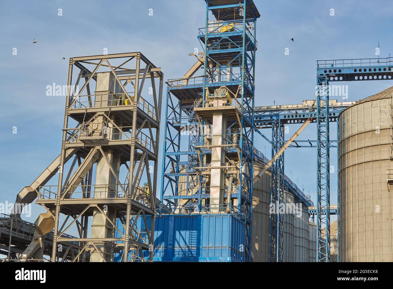 Port grain elevator. Industrial sea trading port bulk cargo zone grain ...