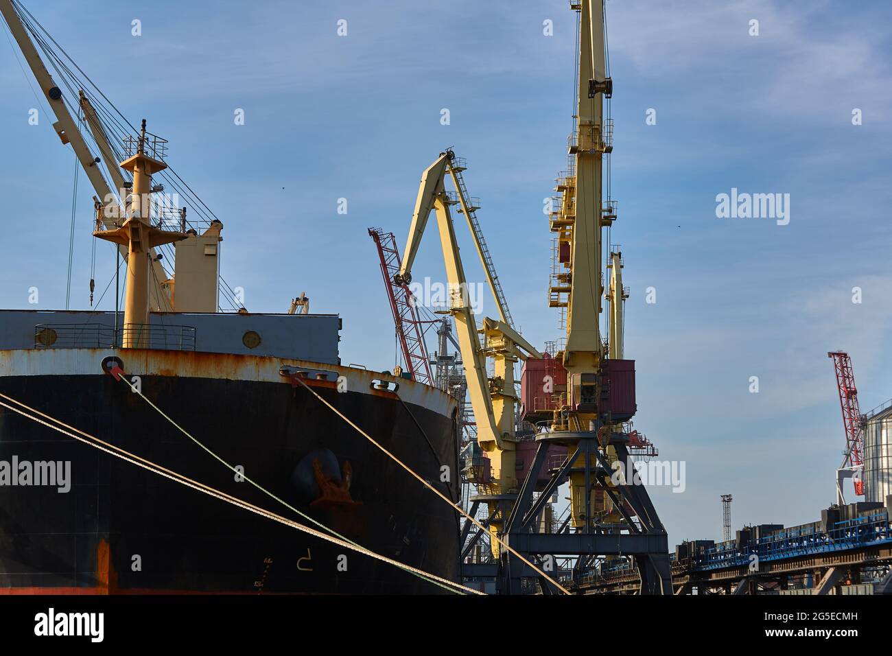 Loading cast iron ingots on ship bulk. Loading metal on ship ...