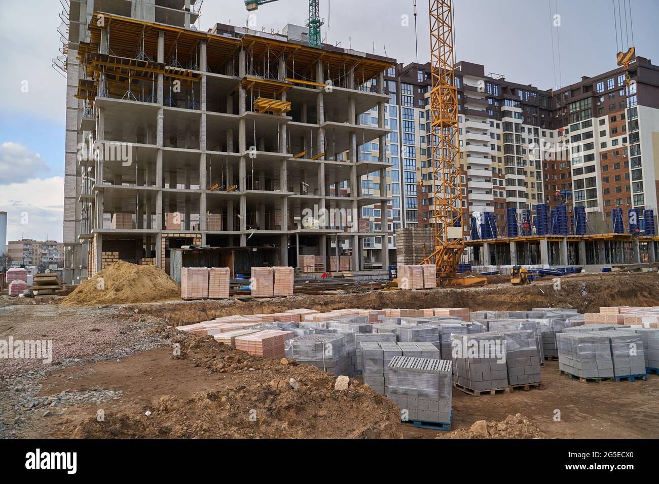 Construction site. High rise Building under construction. Construction ...