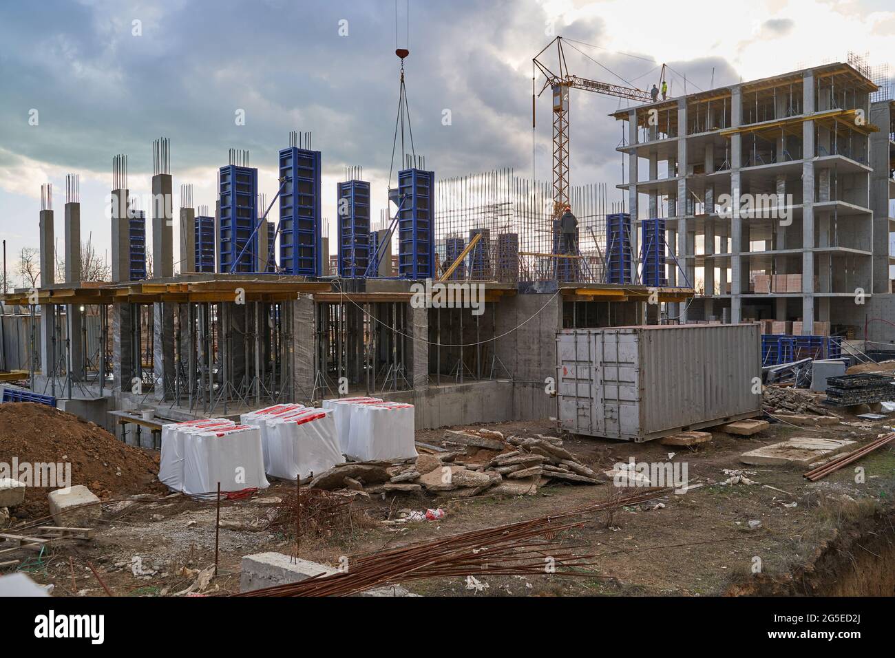 Construction site. High rise Building under construction. Construction ...