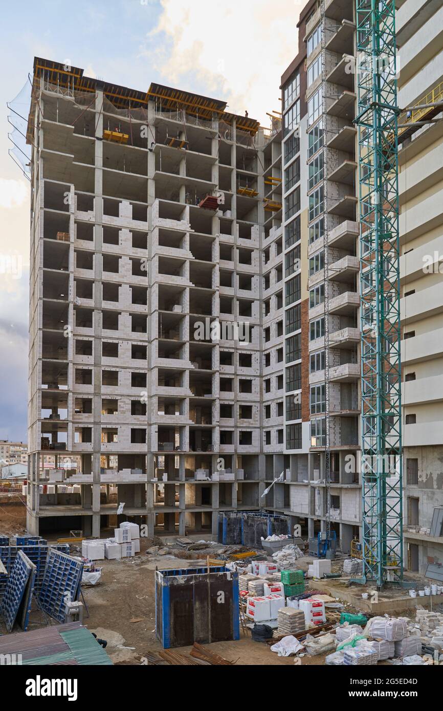 Construction site. High rise Building under construction. Construction ...