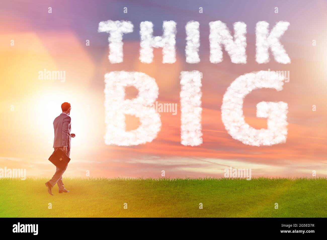 Think big concept with the businessman Stock Photo - Alamy