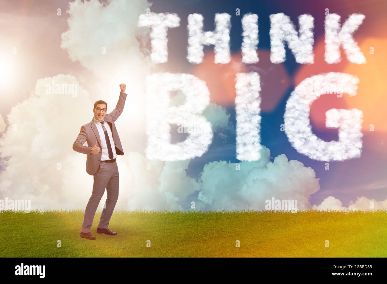 Think big concept with the businessman Stock Photo - Alamy
