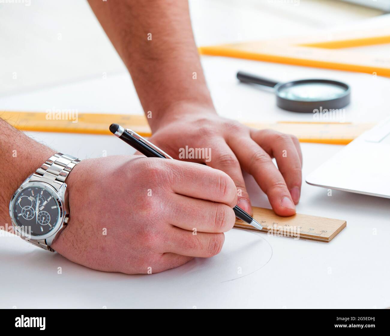 The male engineer working on drawings and blueprints Stock Photo - Alamy