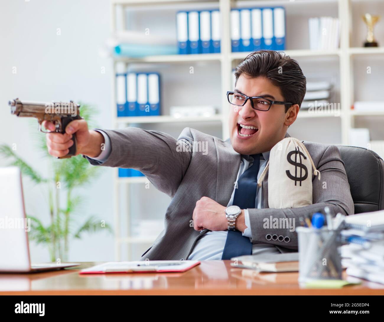 The angry aggressive businessman in the office Stock Photo - Alamy