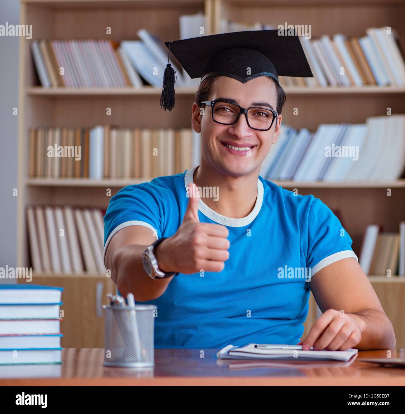 The young man graduating from university Stock Photo - Alamy