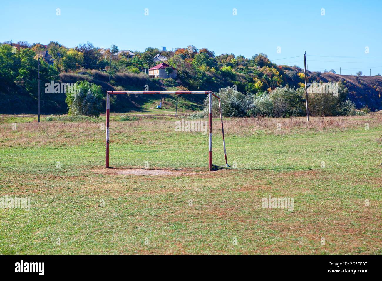 Sport ground in the village . Abandoned Rustic Football Stadium ...