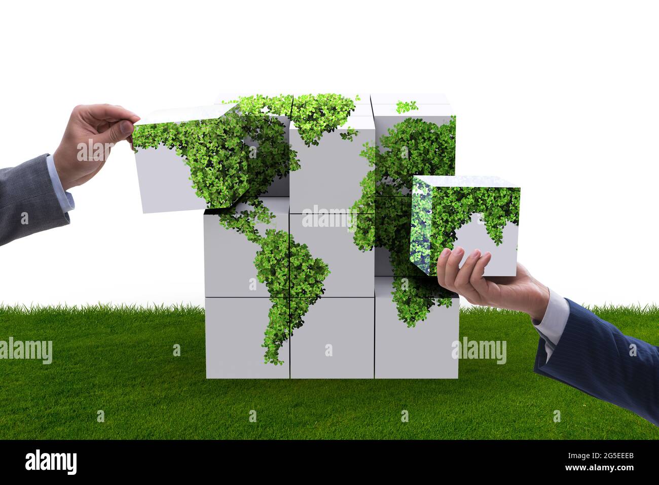 Businessman building world map from the cubes Stock Photo - Alamy