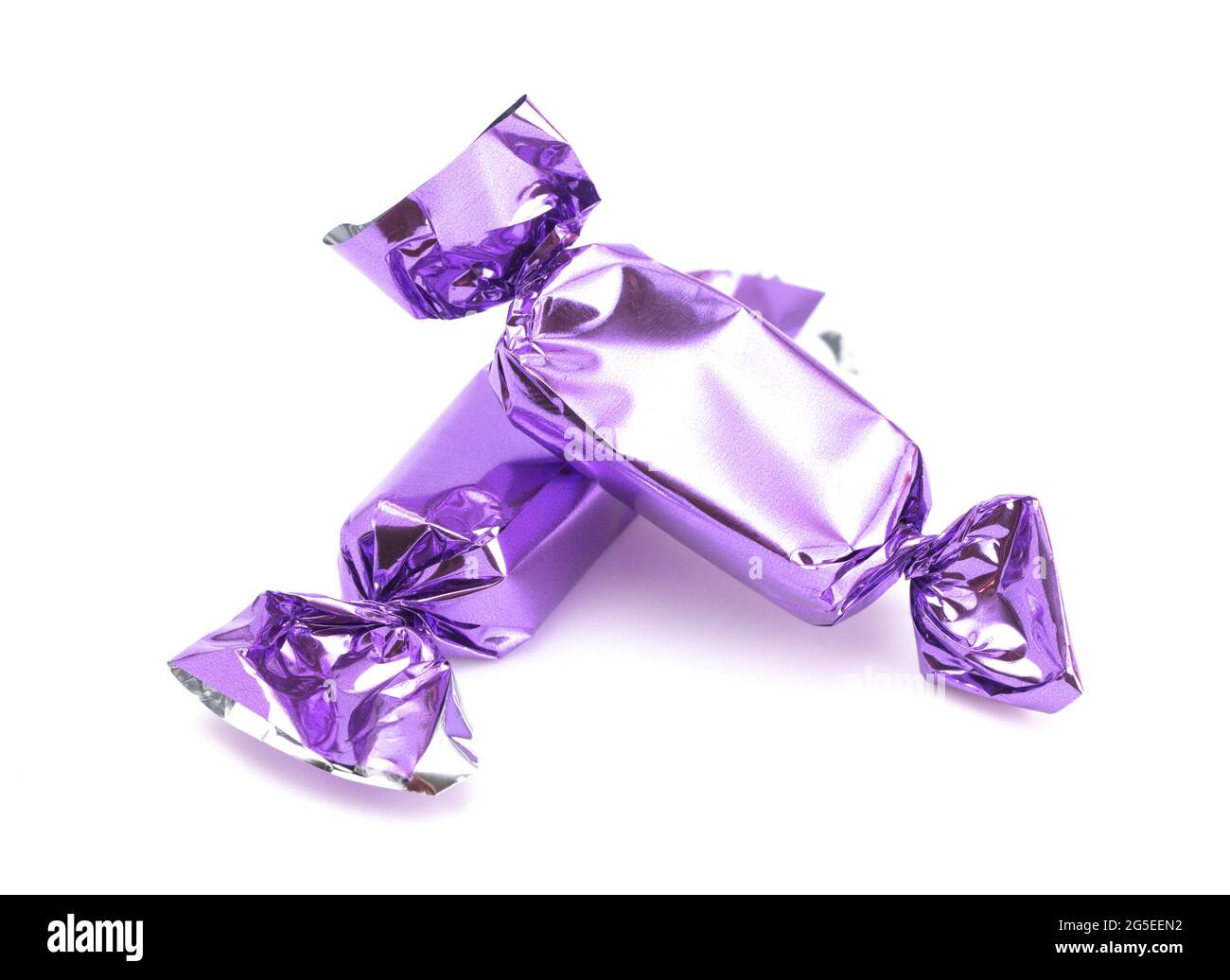 Purple Wrapped Candy on a White Background Stock Photo - Alamy