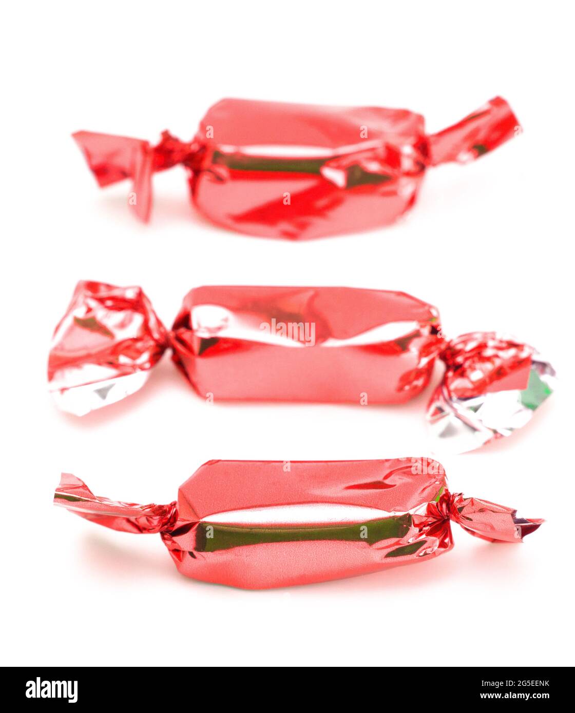 Red Wrapped Candy on a White Background Stock Photo - Alamy