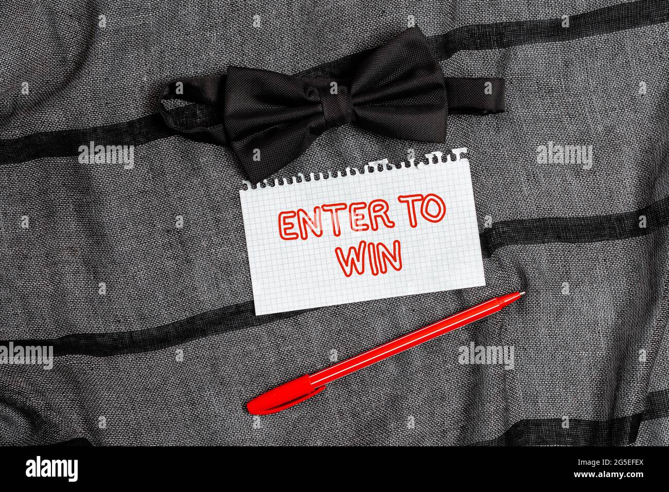 Hand writing sign Enter To Win. Concept meaning exchanging something ...
