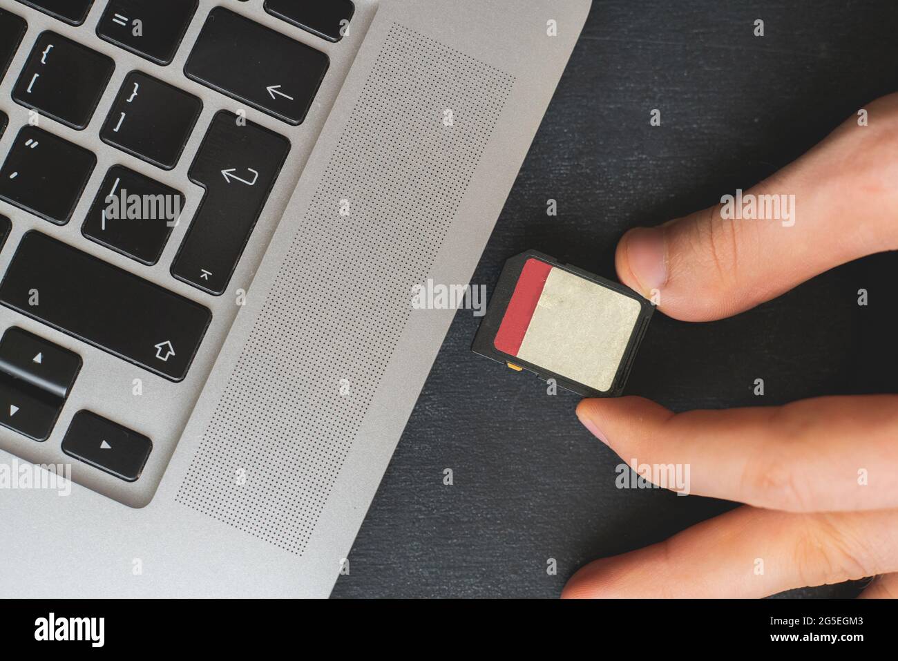 Hand insert usb memory stick hi-res stock photography and images - Alamy
