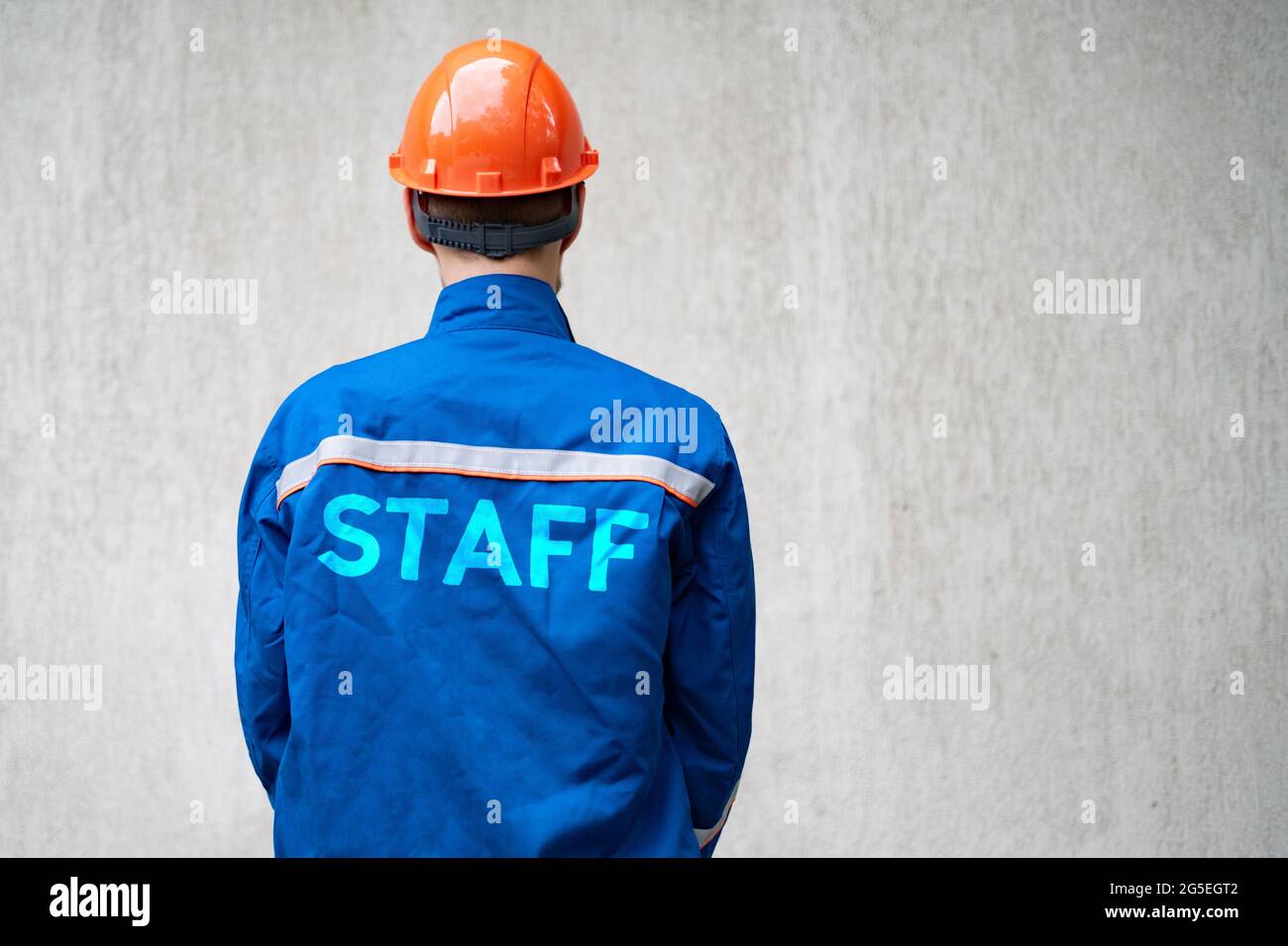close up man person in uniform with word "staff" on it Stock Photo - Alamy