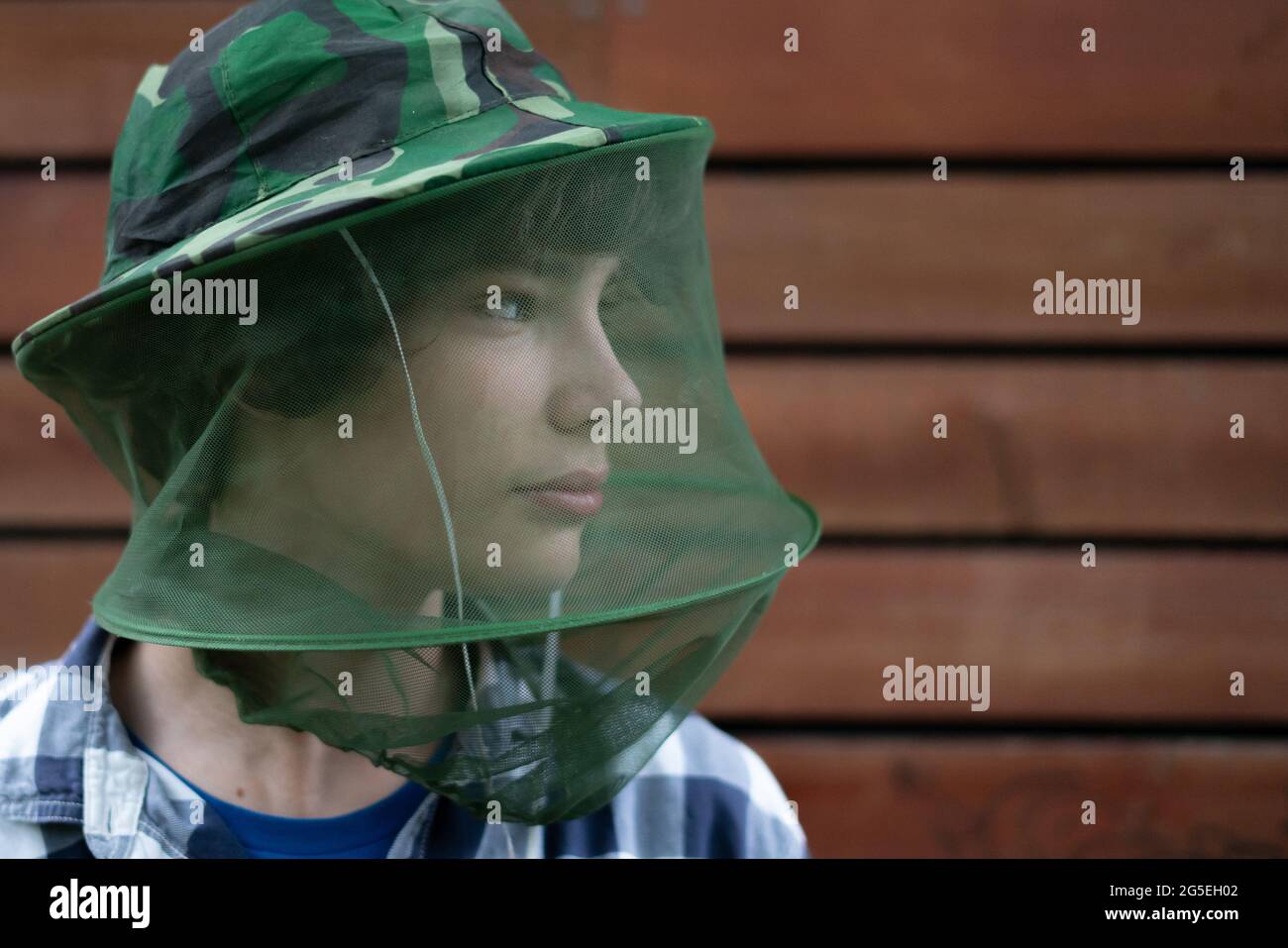 a traveler man in the mosquito mask to protect face from insects Stock ...