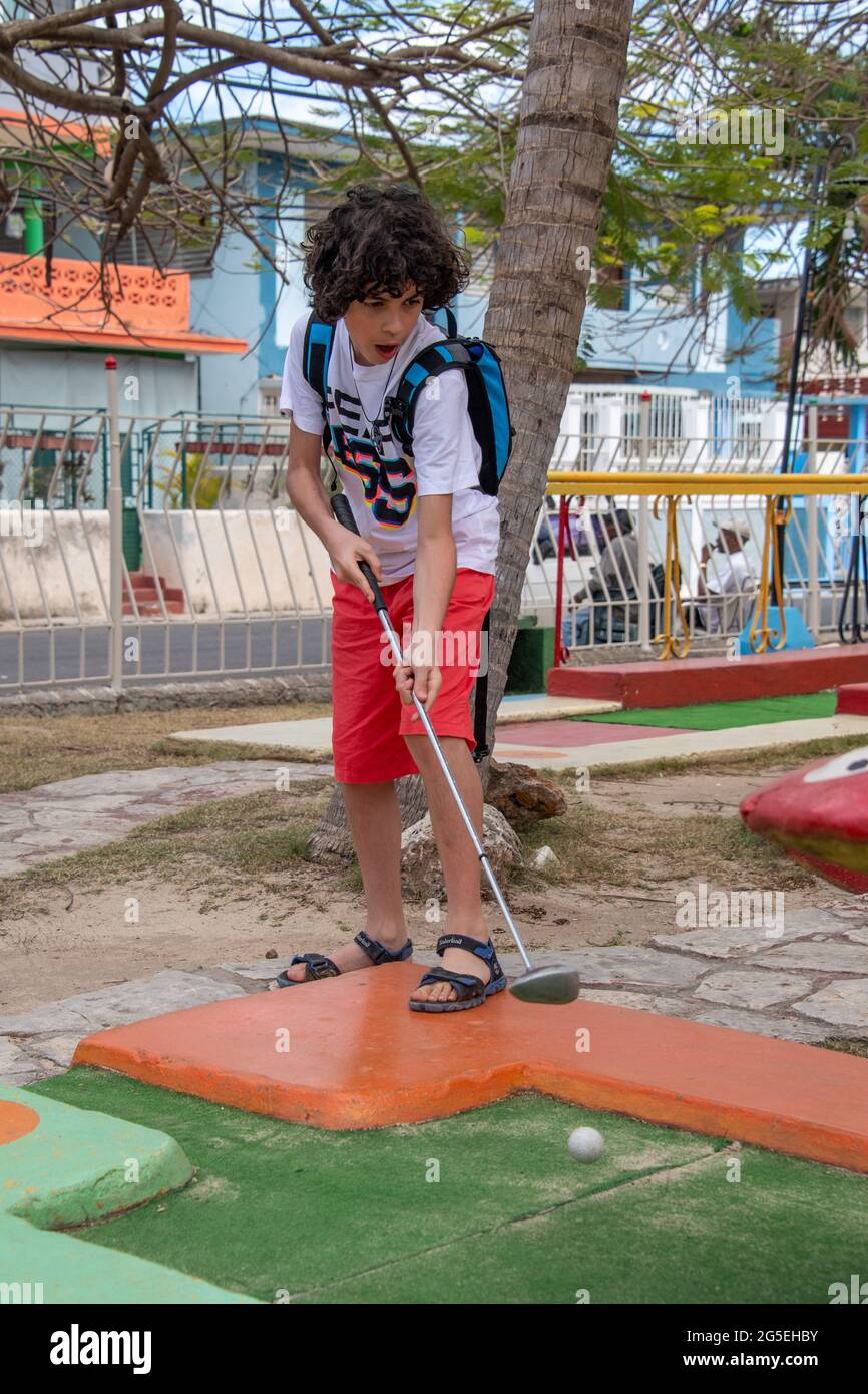 Male child boy tourist playing in El Golfito, Varadero, Cuba Stock ...