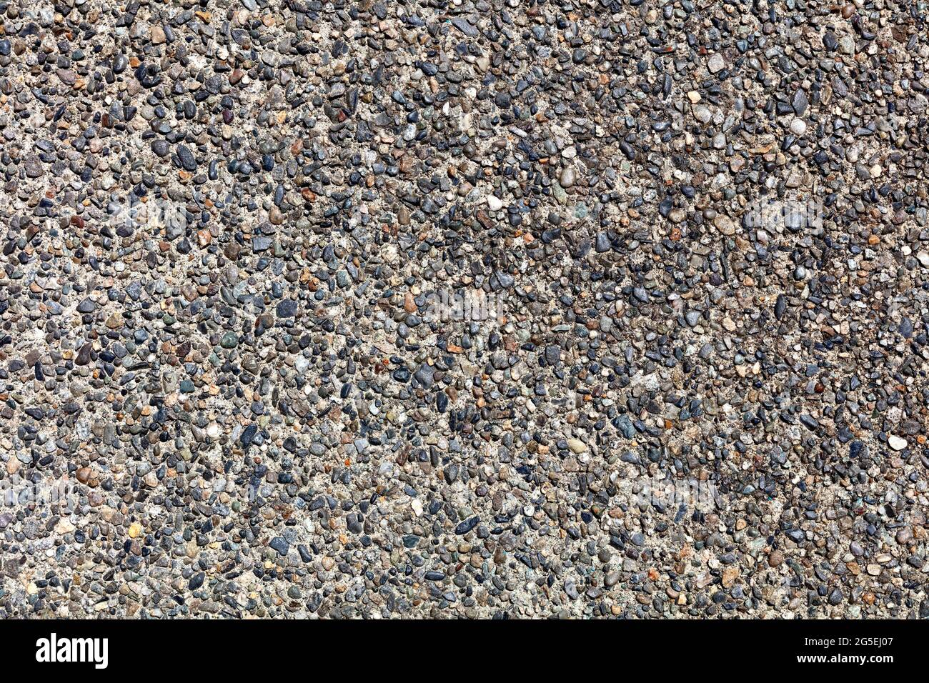 Exposed aggregate concrete background showing beauty of stones Stock ...