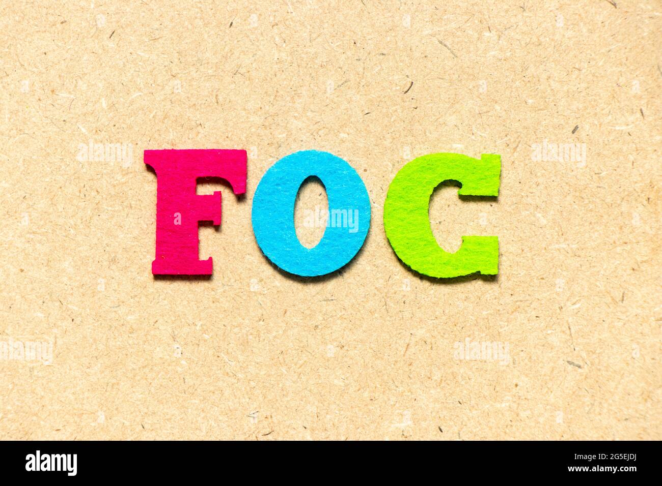 Color cloth alphabet letter in word FOC (Abbreviation of Free of charge ...
