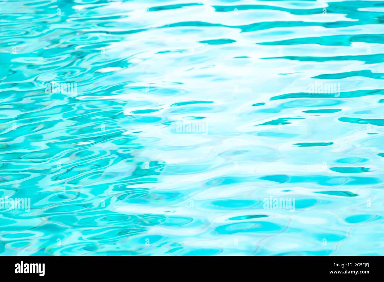 Ripple Water in swimming pool with blue tile floor background Stock ...