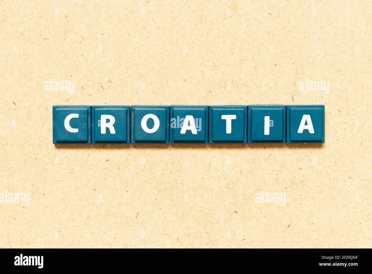Tile alphabet letter in word croatia on wood background Stock Photo - Alamy